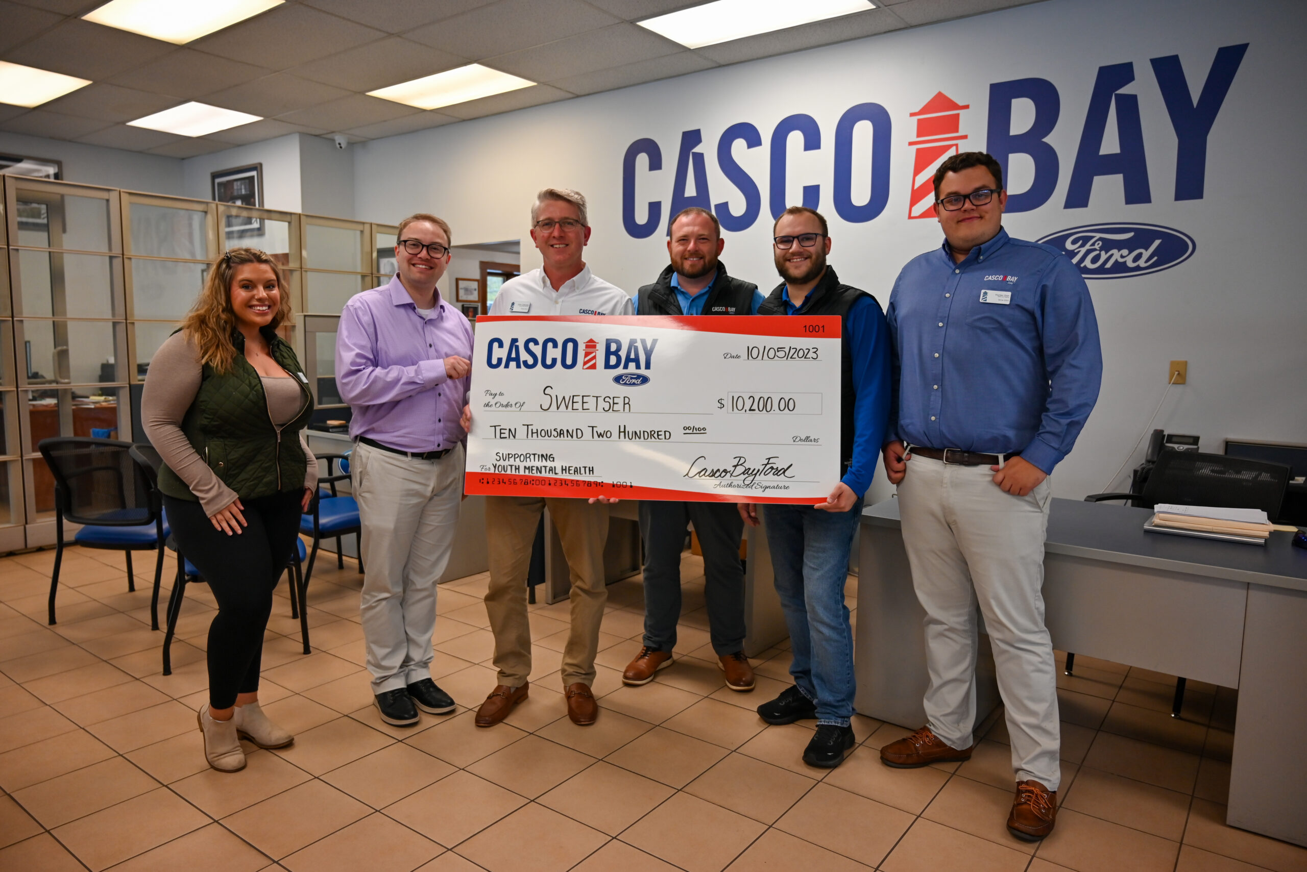 Casco Bay Ford raises $10,000 for youth mental health - Sweetser